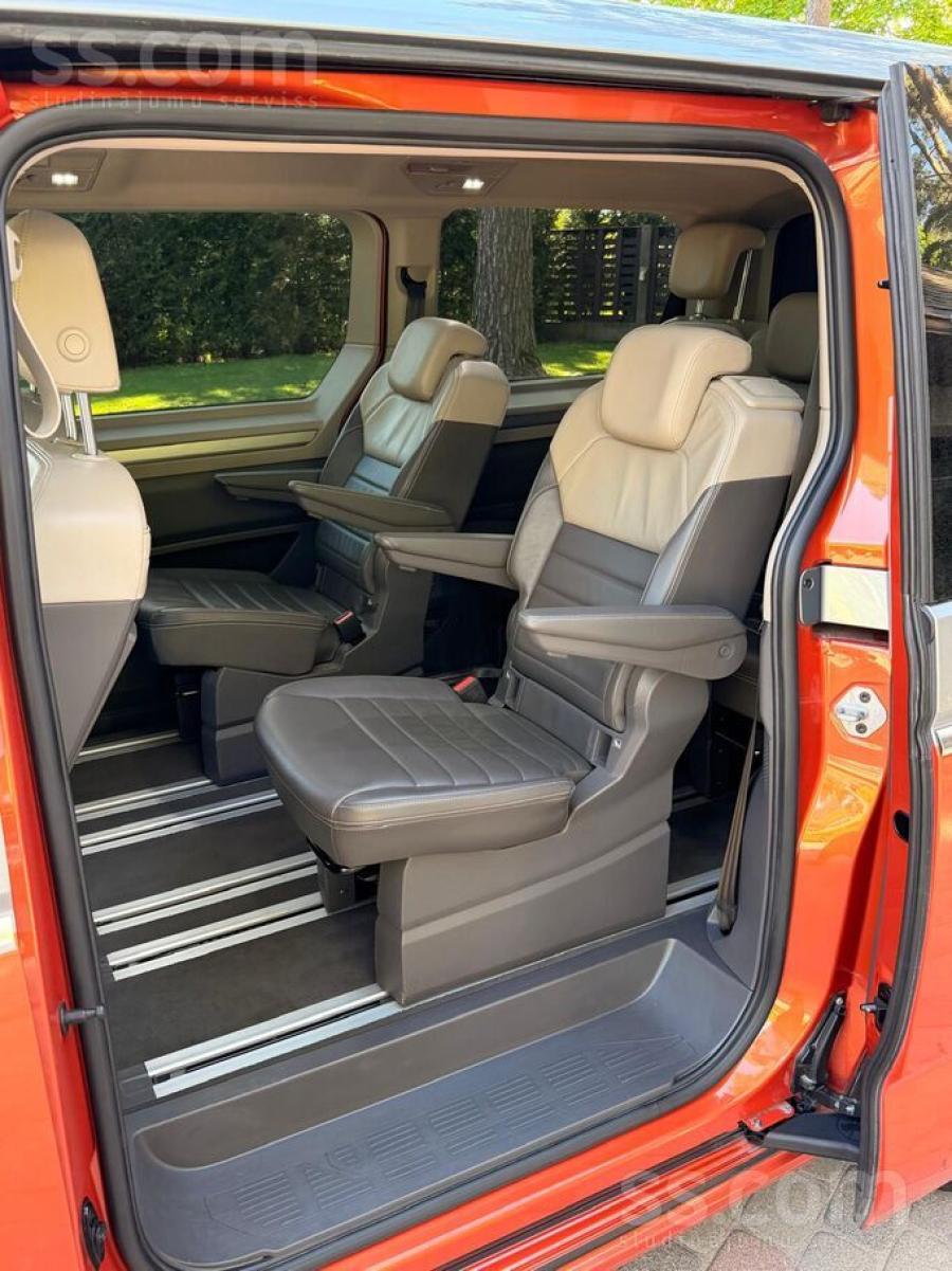 Orange Volkswagen Multivan 2022 in Riga, with an engine capacity of 1.40 L and mileage of 152 thousand km for 42500 €, photo 5 on AUTOMOTO.COM.LV