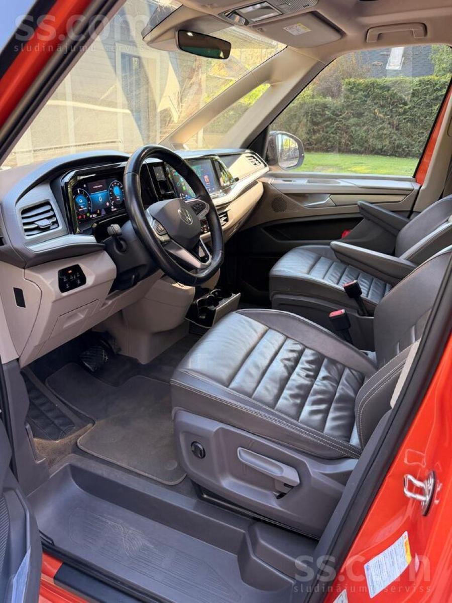 Orange Volkswagen Multivan 2022 in Riga, with an engine capacity of 1.40 L and mileage of 152 thousand km for 42500 €, photo 7 on AUTOMOTO.COM.LV