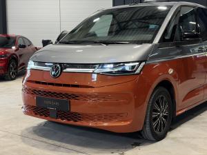 Orange Volkswagen Multivan 2022 in Riga, with an engine capacity of 2.00 L and mileage of 86 thousand km for 39700 €, photo 36 on AUTOMOTO.COM.LV