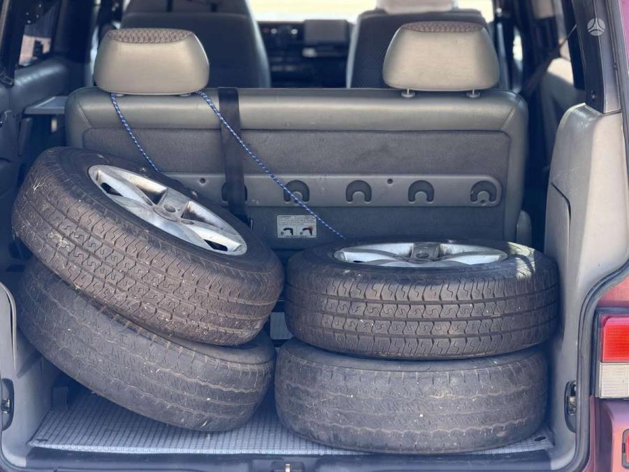 Sarkans Volkswagen Multivan 1996 Šauļi, ar dzinēja tilpumu 2.50 L un nobraukumu 220 tūkst. km par 2700 €, foto 14 vietnē AUTOMOTO.COM.LV