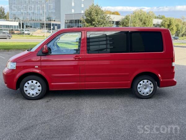Red Volkswagen Multivan 2008 in Riga, with an engine capacity of 2.00 L and mileage of 227 thousand km for 8900 €, photo 3 on AUTOMOTO.COM.LV