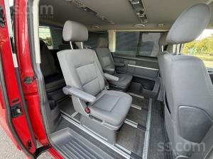 Red Volkswagen Multivan 2008 in Riga, with an engine capacity of 2.00 L and mileage of 227 thousand km for 8900 €, photo 13 on AUTOMOTO.COM.LV
