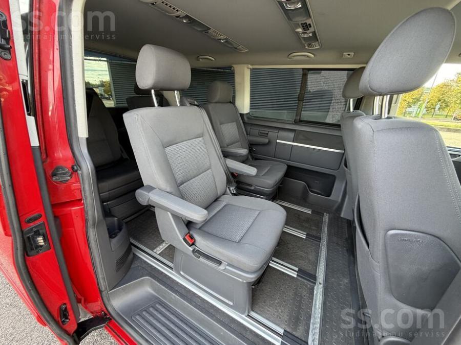 Red Volkswagen Multivan 2008 in Riga, with an engine capacity of 2.00 L and mileage of 227 thousand km for 8900 €, photo 13 on AUTOMOTO.COM.LV