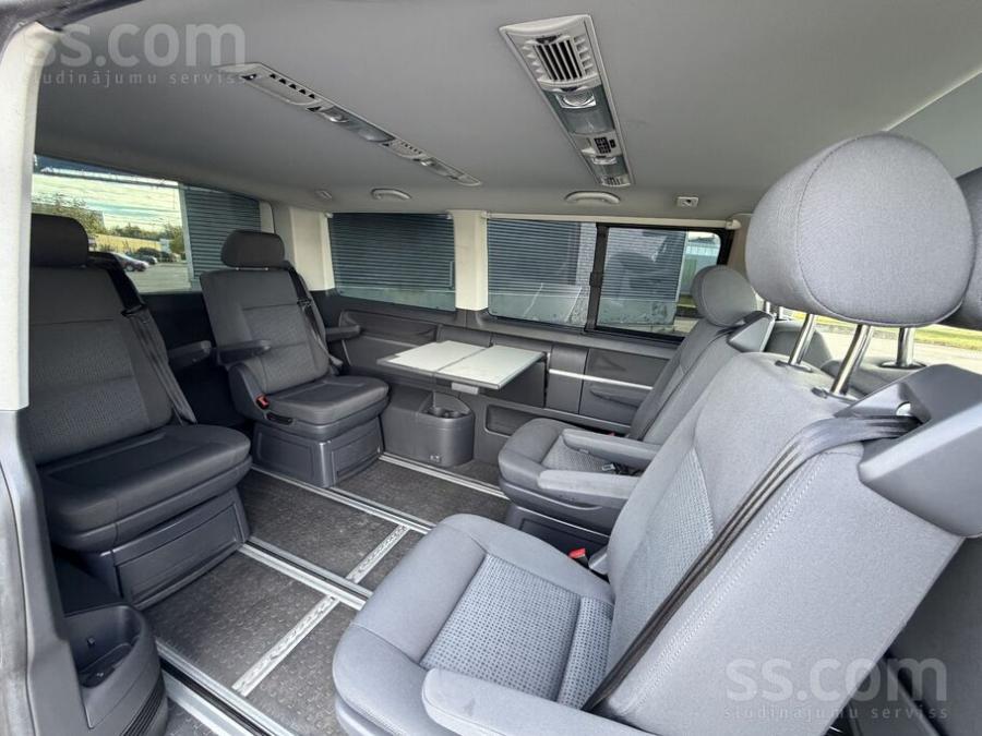 Red Volkswagen Multivan 2008 in Riga, with an engine capacity of 2.00 L and mileage of 227 thousand km for 8900 €, photo 15 on AUTOMOTO.COM.LV