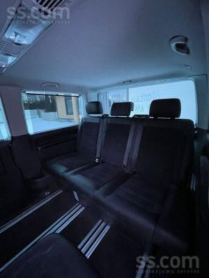 Red Volkswagen Multivan 2017 in Riga, with an engine capacity of 2.00 L and mileage of 95 thousand km for 34999 €, photo 15 on AUTOMOTO.COM.LV