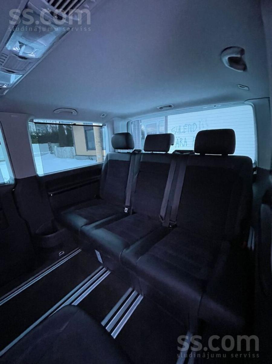 Red Volkswagen Multivan 2017 in Riga, with an engine capacity of 2.00 L and mileage of 95 thousand km for 34999 €, photo 15 on AUTOMOTO.COM.LV