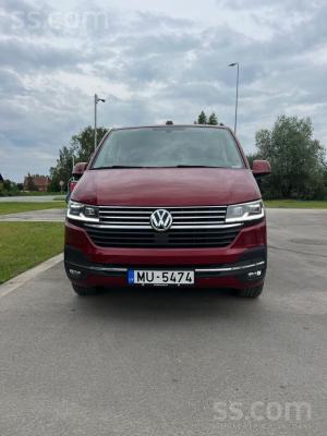 Red Volkswagen Multivan 2021 in Riga, with an engine capacity of 2.00 L and mileage of 105 thousand km for 39000 €, photo 2 on AUTOMOTO.COM.LV