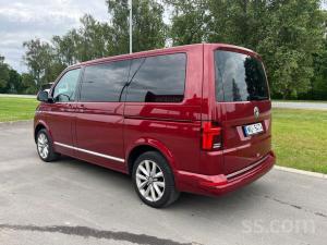 Red Volkswagen Multivan 2021 in Riga, with an engine capacity of 2.00 L and mileage of 105 thousand km for 39000 €, photo 5 on AUTOMOTO.COM.LV