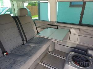 Sarkans Volkswagen Multivan 2007 Rīga, ar dzinēja tilpumu 2.50 L un nobraukumu 201 tūkst. km par 6400 €, foto 15 vietnē AUTOMOTO.COM.LV