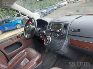 Red Volkswagen Multivan 2012 in Tukums, with an engine capacity of 2.00 L and mileage of 229 thousand km for 17500 €, photo 6 on AUTOMOTO.COM.LV