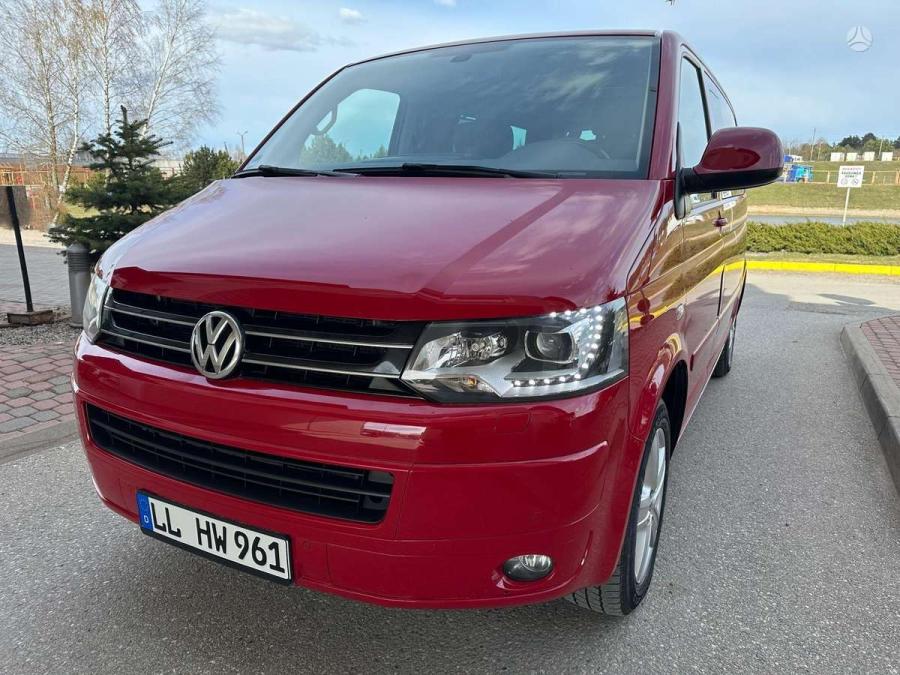 Red Volkswagen Multivan 2013 in Vilnius, with an engine capacity of 1.97 L and mileage of 297 thousand km for 13900 €, photo 3 on AUTOMOTO.COM.LV