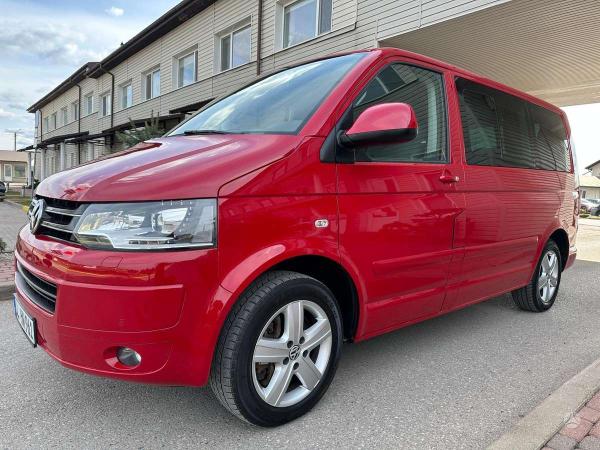 Red Volkswagen Multivan 2013 in Vilnius, with an engine capacity of 1.97 L and mileage of 297 thousand km for 13900 €, photo 3 on AUTOMOTO.COM.LV