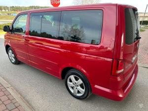 Red Volkswagen Multivan 2013 in Vilnius, with an engine capacity of 1.97 L and mileage of 297 thousand km for 13900 €, photo 5 on AUTOMOTO.COM.LV
