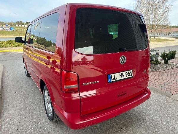 Red Volkswagen Multivan 2013 in Vilnius, with an engine capacity of 1.97 L and mileage of 297 thousand km for 13900 €, photo 6 on AUTOMOTO.COM.LV