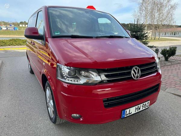 Red Volkswagen Multivan 2013 in Vilnius, with an engine capacity of 1.97 L and mileage of 297 thousand km for 13900 €, photo 10 on AUTOMOTO.COM.LV