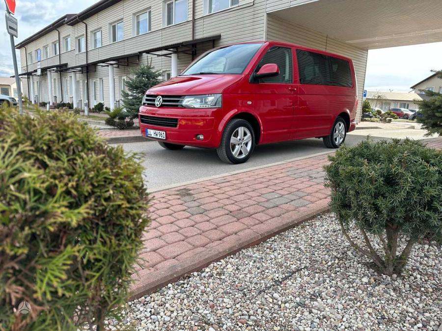Red Volkswagen Multivan 2013 in Vilnius, with an engine capacity of 1.97 L and mileage of 297 thousand km for 13900 €, photo 14 on AUTOMOTO.COM.LV