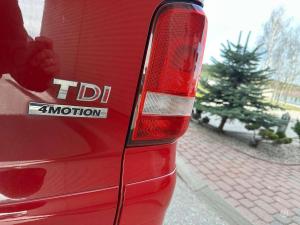 Red Volkswagen Multivan 2013 in Vilnius, with an engine capacity of 1.97 L and mileage of 297 thousand km for 13900 €, photo 16 on AUTOMOTO.COM.LV