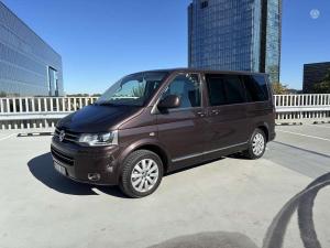 Violet Volkswagen Multivan 2013 in Vilnius, with an engine capacity of 1.97 L and mileage of 232 thousand km for 22200 €, photo 1 on AUTOMOTO.COM.LV