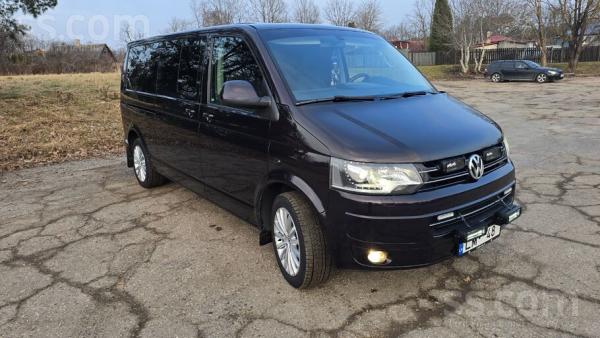 Violet Volkswagen Multivan 2015 in Valmiera, with an engine capacity of 2.00 L and mileage of 252 thousand km for 21000 €, photo 3 on AUTOMOTO.COM.LV