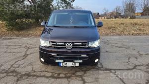 Violet Volkswagen Multivan 2015 in Valmiera, with an engine capacity of 2.00 L and mileage of 252 thousand km for 21000 €, photo 4 on AUTOMOTO.COM.LV
