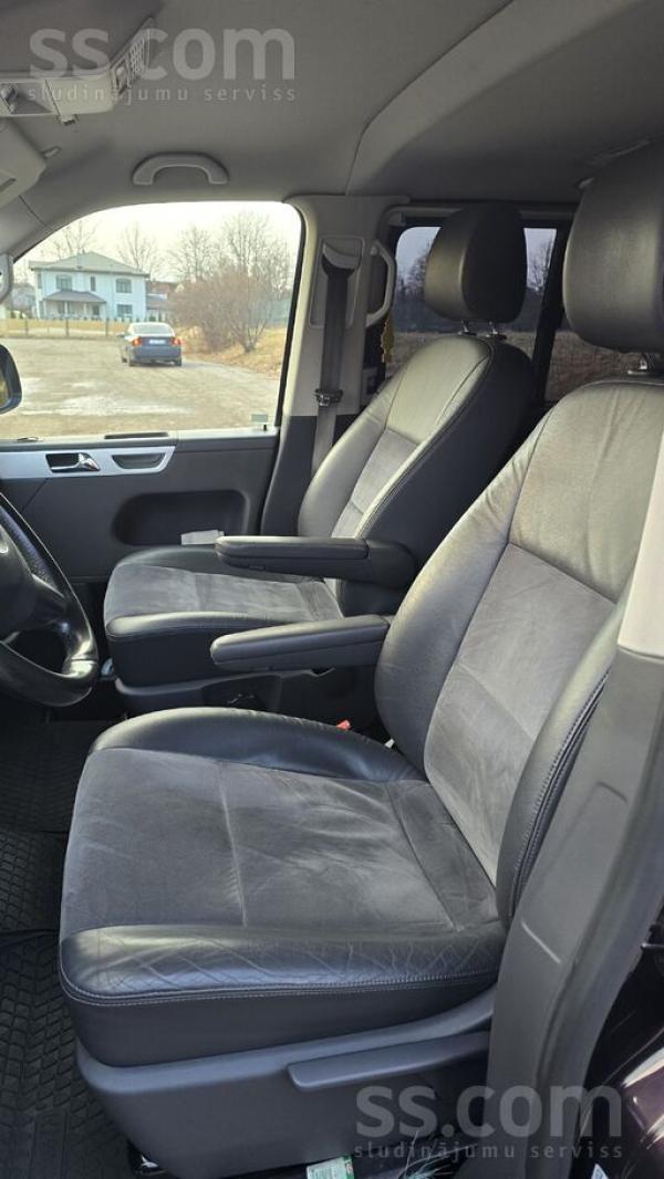 Violet Volkswagen Multivan 2015 in Valmiera, with an engine capacity of 2.00 L and mileage of 252 thousand km for 21000 €, photo 6 on AUTOMOTO.COM.LV