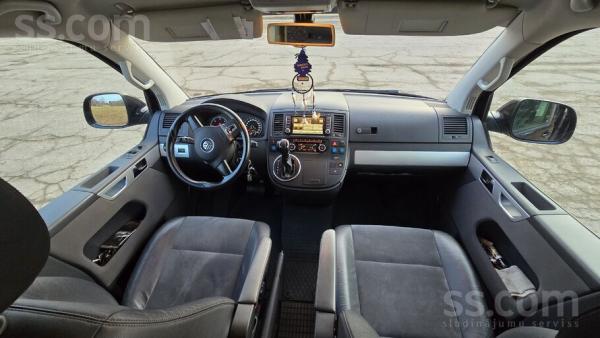 Violet Volkswagen Multivan 2015 in Valmiera, with an engine capacity of 2.00 L and mileage of 252 thousand km for 21000 €, photo 7 on AUTOMOTO.COM.LV