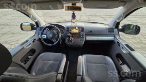 Violet Volkswagen Multivan 2015 in Valmiera, with an engine capacity of 2.00 L and mileage of 252 thousand km for 21000 €, photo 7 on AUTOMOTO.COM.LV