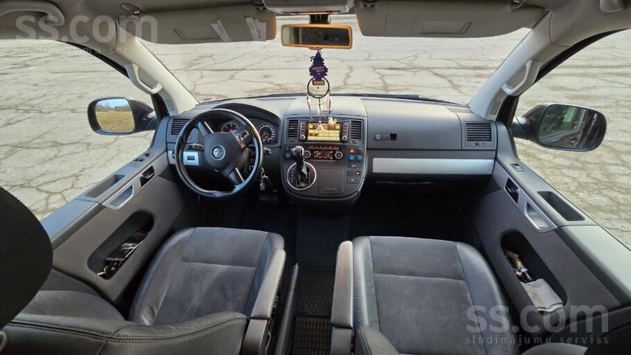 Violet Volkswagen Multivan 2015 in Valmiera, with an engine capacity of 2.00 L and mileage of 252 thousand km for 21000 €, photo 7 on AUTOMOTO.COM.LV