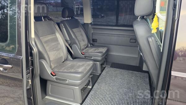 Violet Volkswagen Multivan 2015 in Valmiera, with an engine capacity of 2.00 L and mileage of 252 thousand km for 21000 €, photo 8 on AUTOMOTO.COM.LV