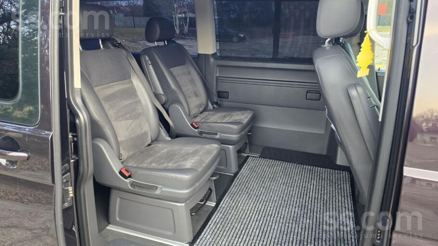 Violet Volkswagen Multivan 2015 in Valmiera, with an engine capacity of 2.00 L and mileage of 252 thousand km for 21000 €, photo 8 on AUTOMOTO.COM.LV