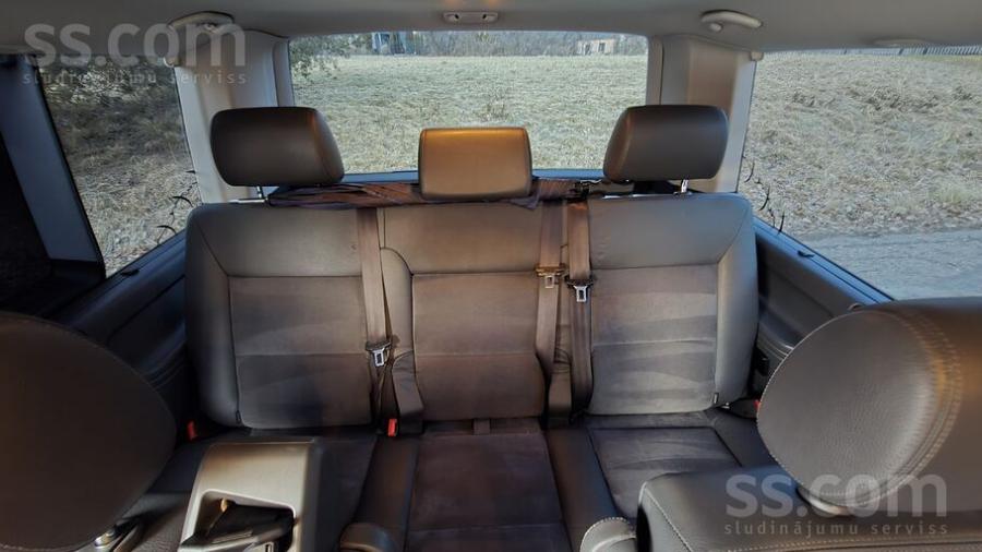 Violet Volkswagen Multivan 2015 in Valmiera, with an engine capacity of 2.00 L and mileage of 252 thousand km for 21000 €, photo 9 on AUTOMOTO.COM.LV