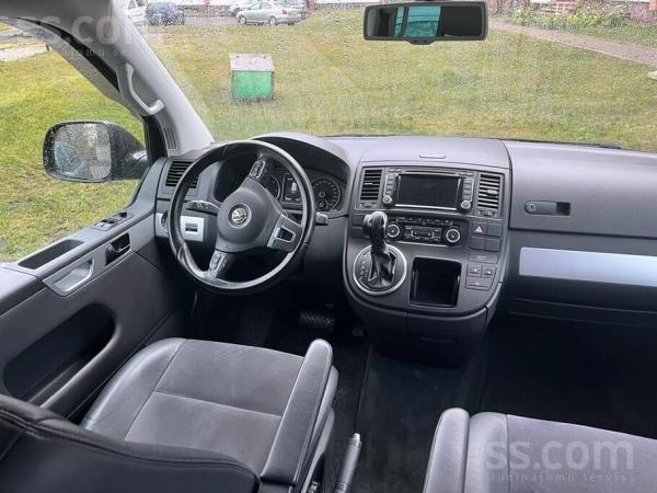Violet Volkswagen Multivan 2015 in Riga, with an engine capacity of 2.00 L and mileage of 178 thousand km for 23000 €, photo 3 on AUTOMOTO.COM.LV