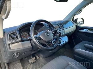 Violet Volkswagen Multivan 2016 in Riga, with an engine capacity of 2.00 L and mileage of 286 thousand km for 20200 €, photo 12 on AUTOMOTO.COM.LV