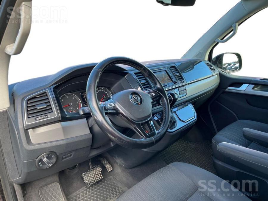 Violet Volkswagen Multivan 2016 in Riga, with an engine capacity of 2.00 L and mileage of 286 thousand km for 20200 €, photo 12 on AUTOMOTO.COM.LV