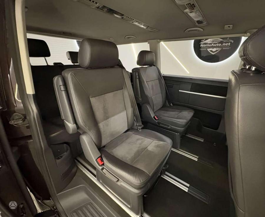 Violet Volkswagen Multivan 2010 in Marijampole, with an engine capacity of 1.97 L and mileage of 257 thousand km for 15999 €, photo 12 on AUTOMOTO.COM.LV