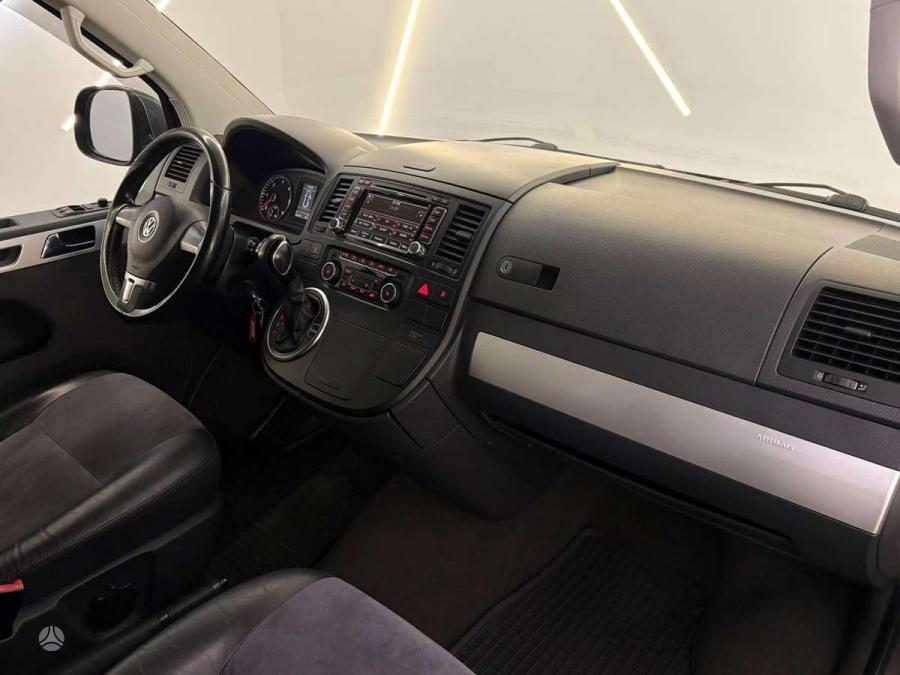 Violet Volkswagen Multivan 2010 in Marijampole, with an engine capacity of 1.97 L and mileage of 257 thousand km for 15999 €, photo 18 on AUTOMOTO.COM.LV