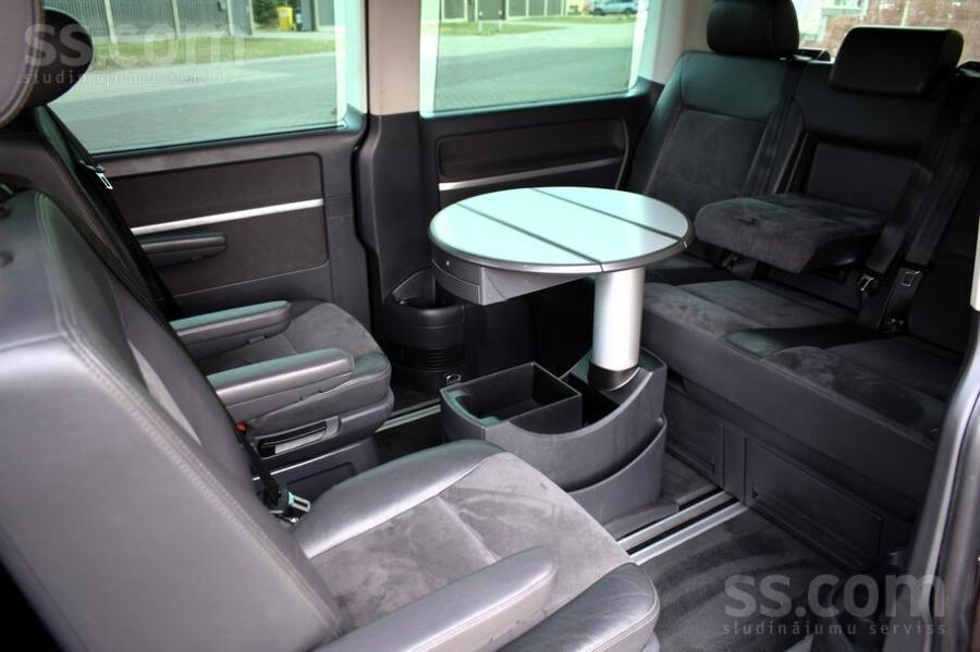 Violet Volkswagen Multivan 2013 in Riga, with an engine capacity of 2.00 L and mileage of 206 thousand km for 18790 €, photo 12 on AUTOMOTO.COM.LV