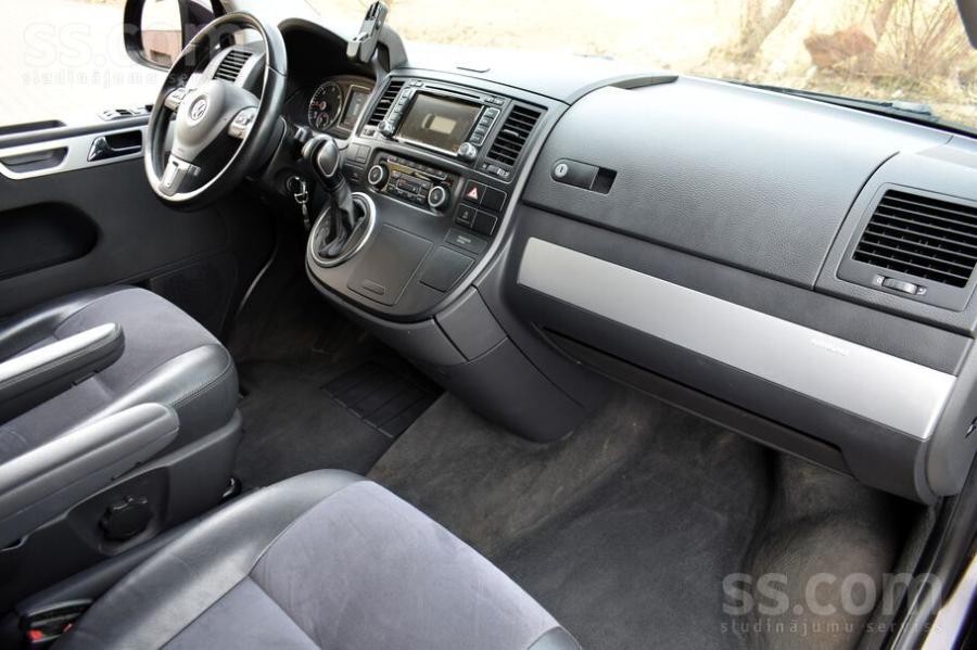 Violet Volkswagen Multivan 2013 in Riga, with an engine capacity of 2.00 L and mileage of 206 thousand km for 18790 €, photo 15 on AUTOMOTO.COM.LV