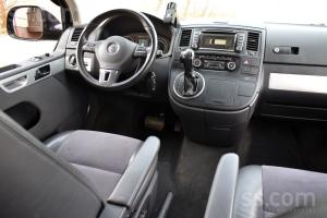 Violet Volkswagen Multivan 2013 in Riga, with an engine capacity of 2.00 L and mileage of 206 thousand km for 18790 €, photo 18 on AUTOMOTO.COM.LV