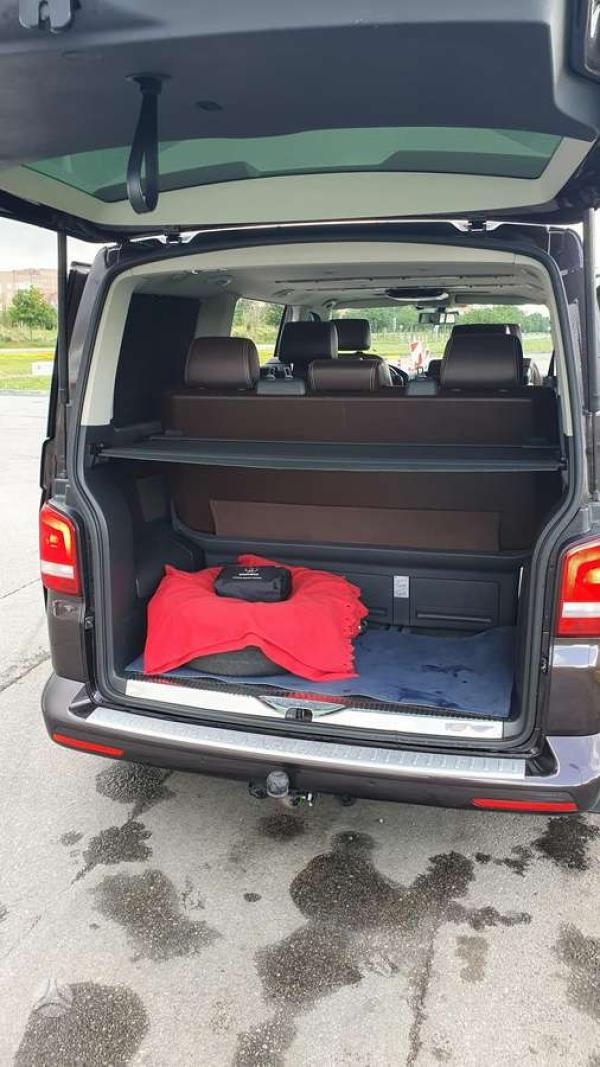 Violet Volkswagen Multivan 2013 in Klaipeda, with an engine capacity of 1.98 L and mileage of 291 thousand km for 18950 €, photo 10 on AUTOMOTO.COM.LV