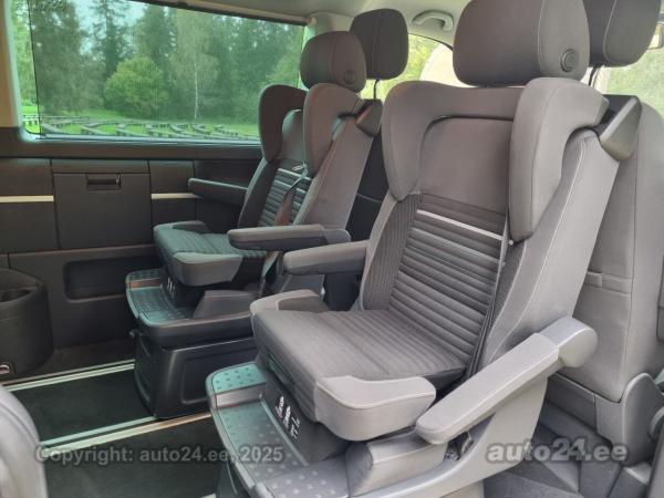 Violets Volkswagen Multivan 2014 Tallina, ar dzinēja tilpumu 2.00 L un nobraukumu 220 tūkst. km par 20000 €, foto 11 vietnē AUTOMOTO.COM.LV