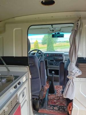 White Volkswagen Multivan 2003 in Marijampole, with an engine capacity of 2.50 L and mileage of 270 thousand km for 6200 €, photo 15 on AUTOMOTO.COM.LV