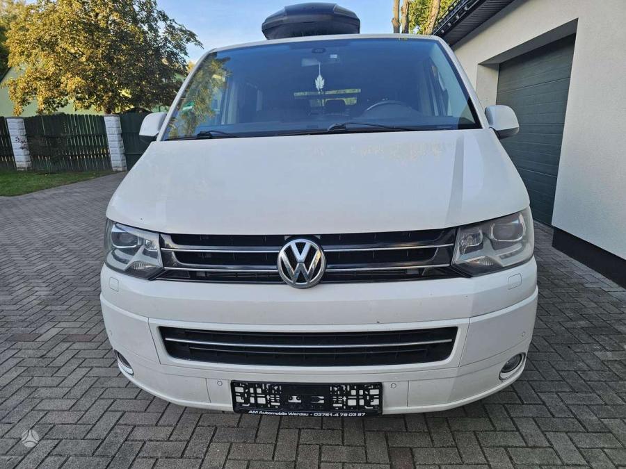 White Volkswagen Multivan 2013 in Kedainiai, with an engine capacity of 1.97 L and mileage of 279 thousand km for 14999 €, photo 3 on AUTOMOTO.COM.LV