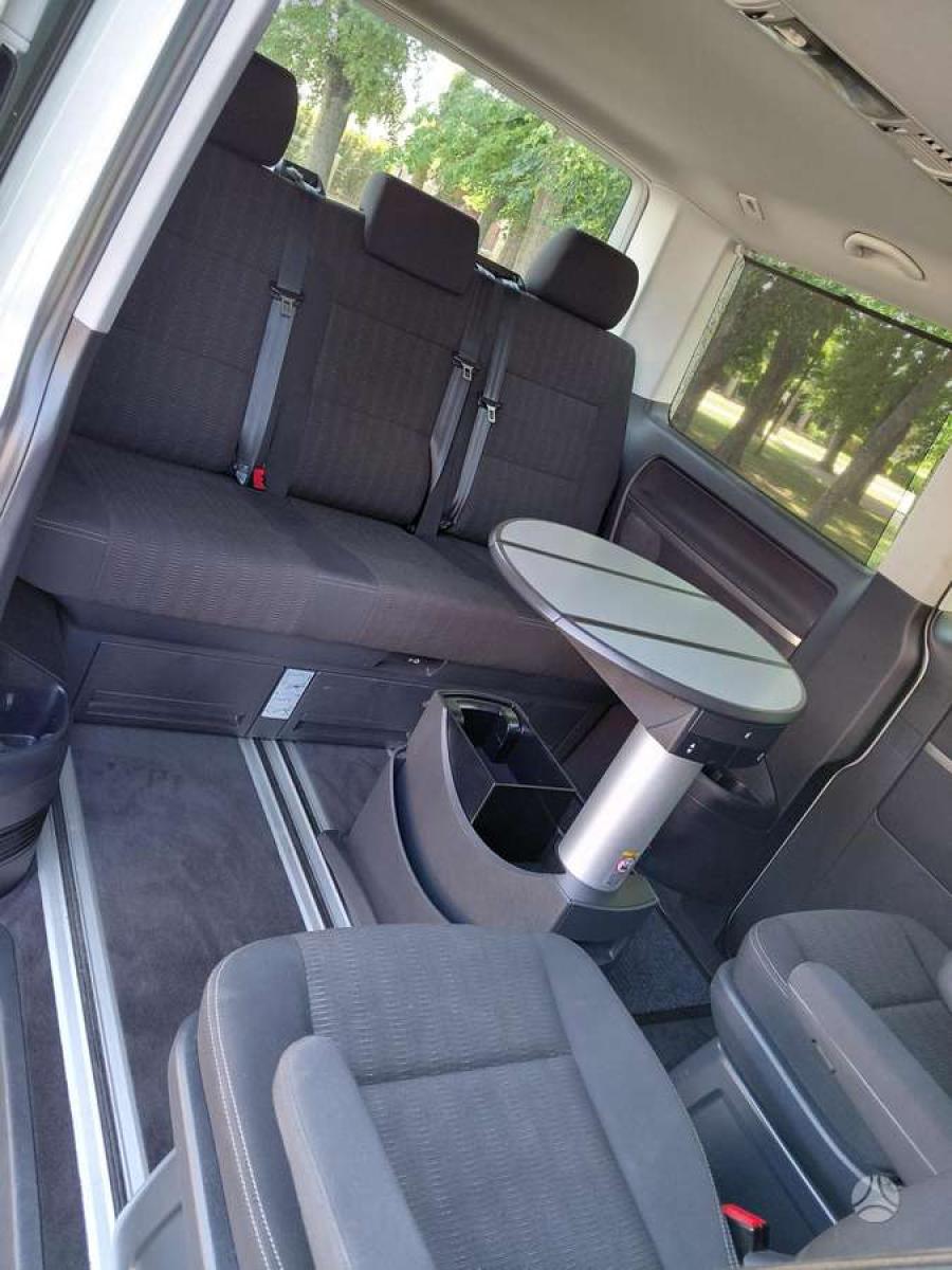 White Volkswagen Multivan 2016 in Vilkaviskis, with an engine capacity of 2.00 L and mileage of 210 thousand km for 22600 €, photo 32 on AUTOMOTO.COM.LV