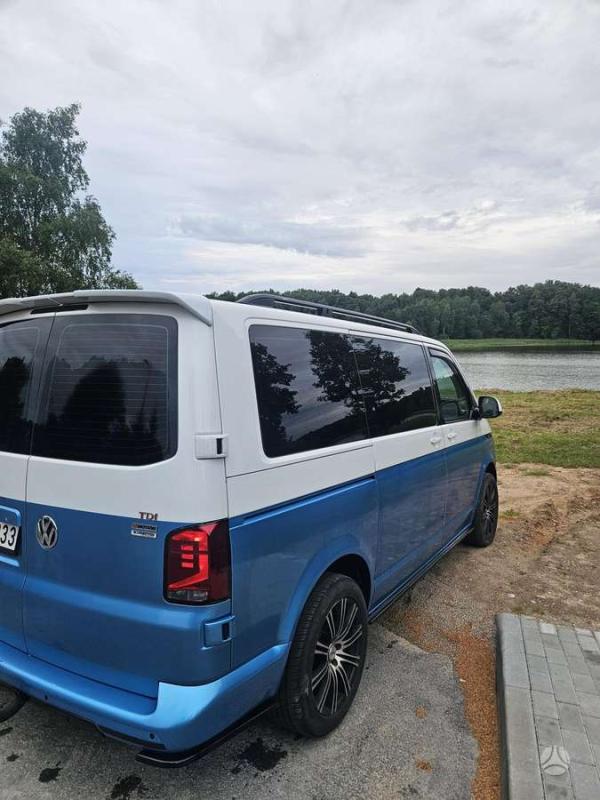 White Volkswagen Multivan 2021 in Kaisiadorys, with an engine capacity of 2.00 L and mileage of 190 thousand km for 27500 €, photo 4 on AUTOMOTO.COM.LV
