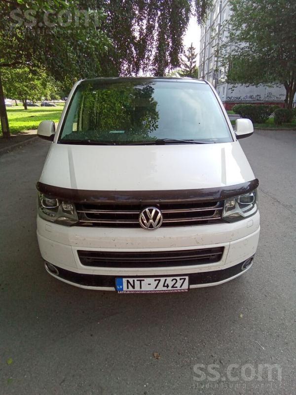 White Volkswagen Multivan 2012 in Riga, with an engine capacity of 2.00 L and mileage of 205 thousand km for 19900 €, photo 5 on AUTOMOTO.COM.LV
