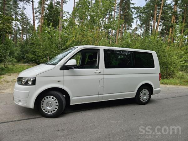 White Volkswagen Multivan 2014 in Riga, with an engine capacity of 2.00 L and mileage of 269 thousand km for 13850 €, photo 4 on AUTOMOTO.COM.LV