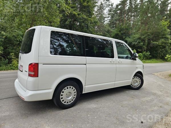 White Volkswagen Multivan 2014 in Riga, with an engine capacity of 2.00 L and mileage of 269 thousand km for 13850 €, photo 7 on AUTOMOTO.COM.LV
