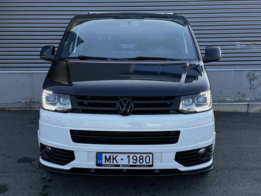 White Volkswagen Multivan 2015 in Riga, with an engine capacity of 2.00 L and mileage of 210 thousand km for 19500 €, photo 9 on AUTOMOTO.COM.LV
