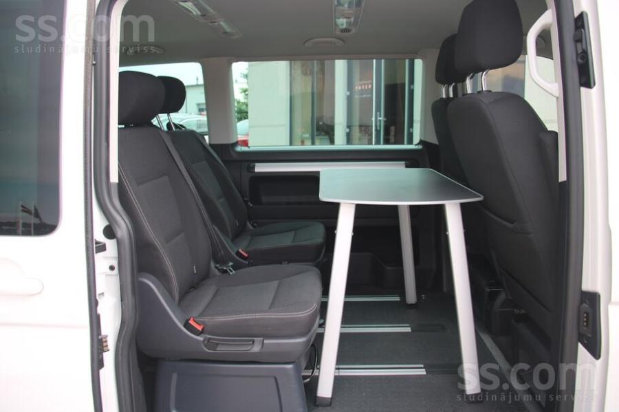 White Volkswagen Multivan 2016 in Tukums, with an engine capacity of 2.00 L and mileage of 243 thousand km for 19568 €, photo 13 on AUTOMOTO.COM.LV